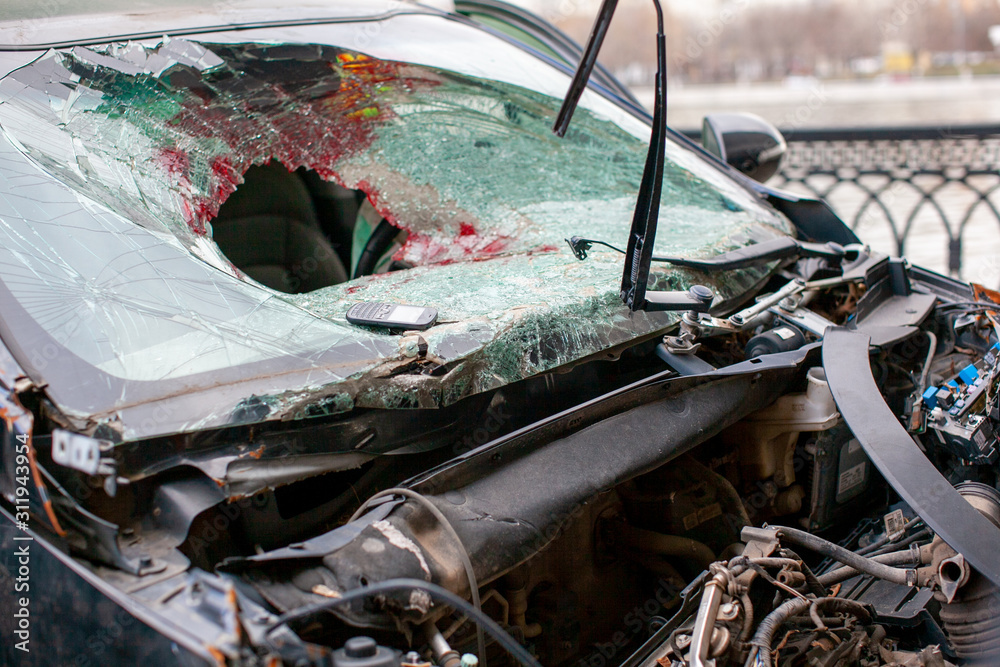 Foto de Stock Broken car windshield after an accident with traces of ...