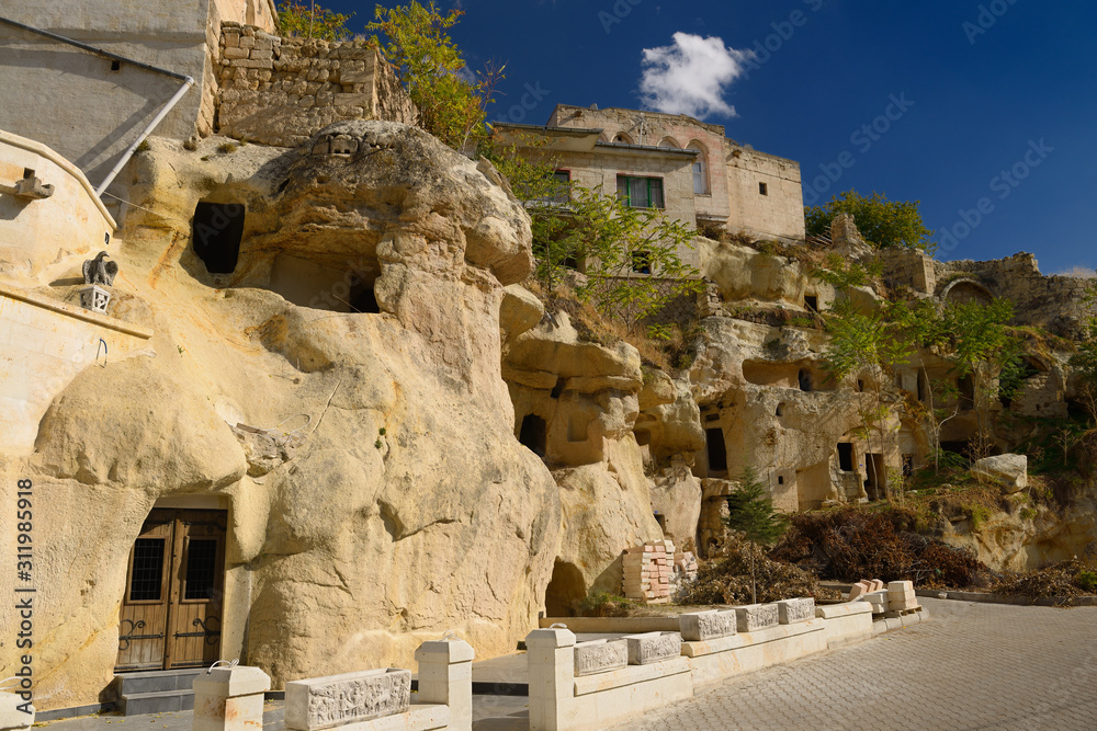Construction development on volcanic tuff cave houses at Mustafapasa ...