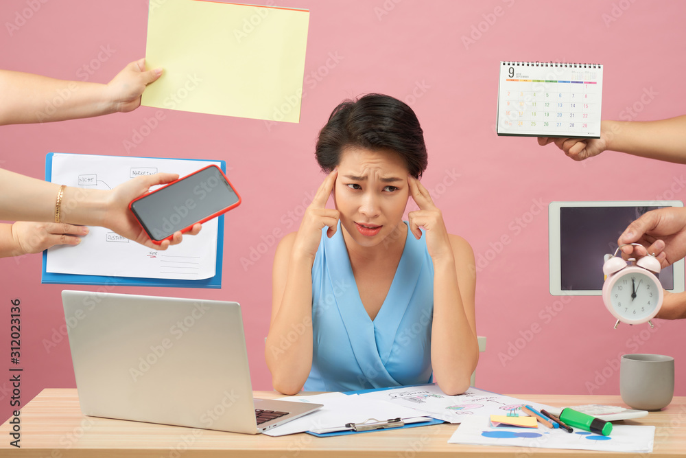 Overworked young employee refuses all things, frowns face in annoyance ...