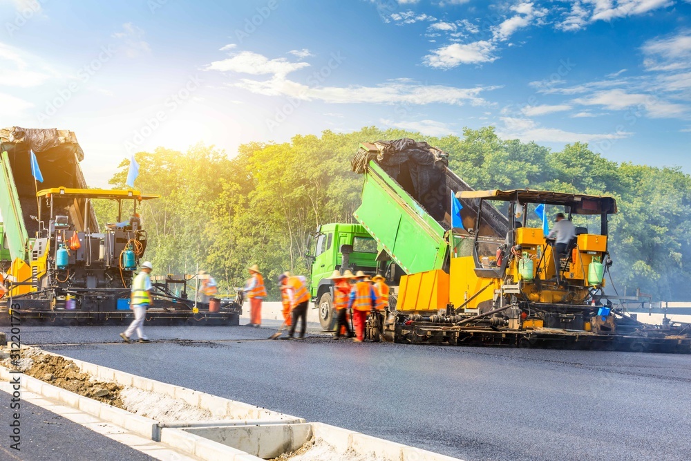 Construction site is laying new asphalt road pavement,road construction ...