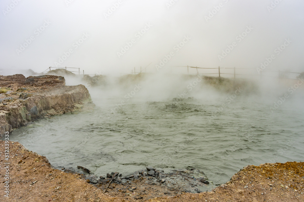 Hot mud pool with bubbles in Kawah Sikidang, Dieng plateau, Java ...