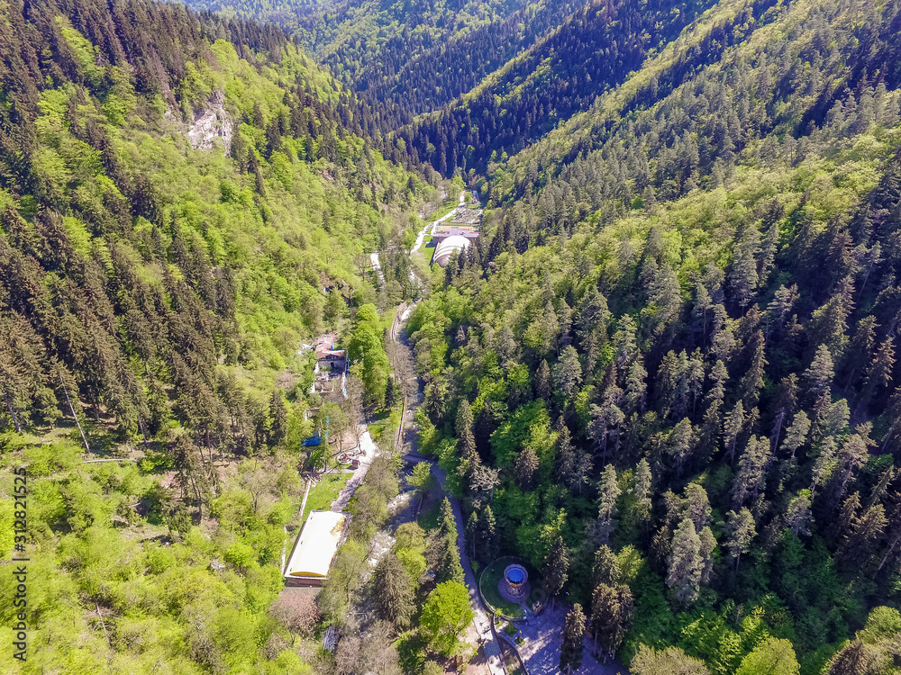 great waterfall and forest view from funicular transport in Borjomi ...