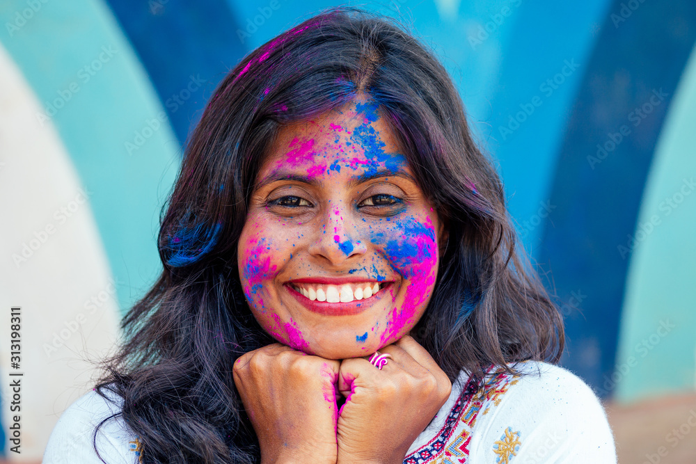 Holi Festival Of Colours. Portrait of happy indian girl in holi color ...