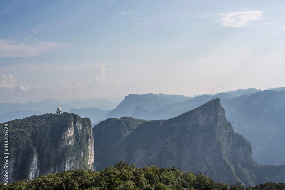 Tianmen Mountain Known as The Heaven`s Gate surrounded by the green ...