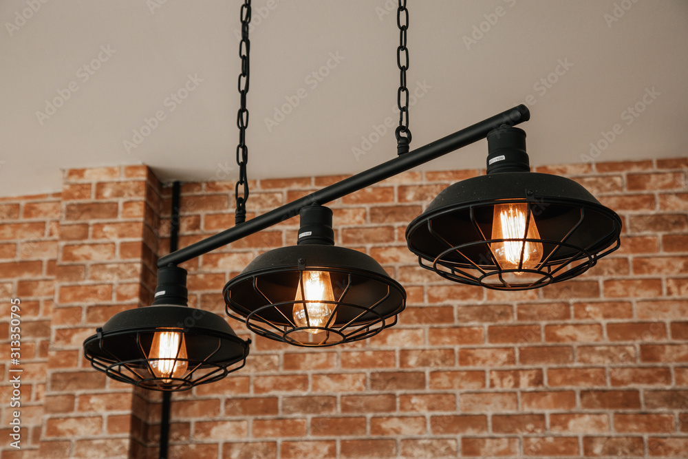 Vintage dome light using filament tungsten gives a warm orange glow in ...