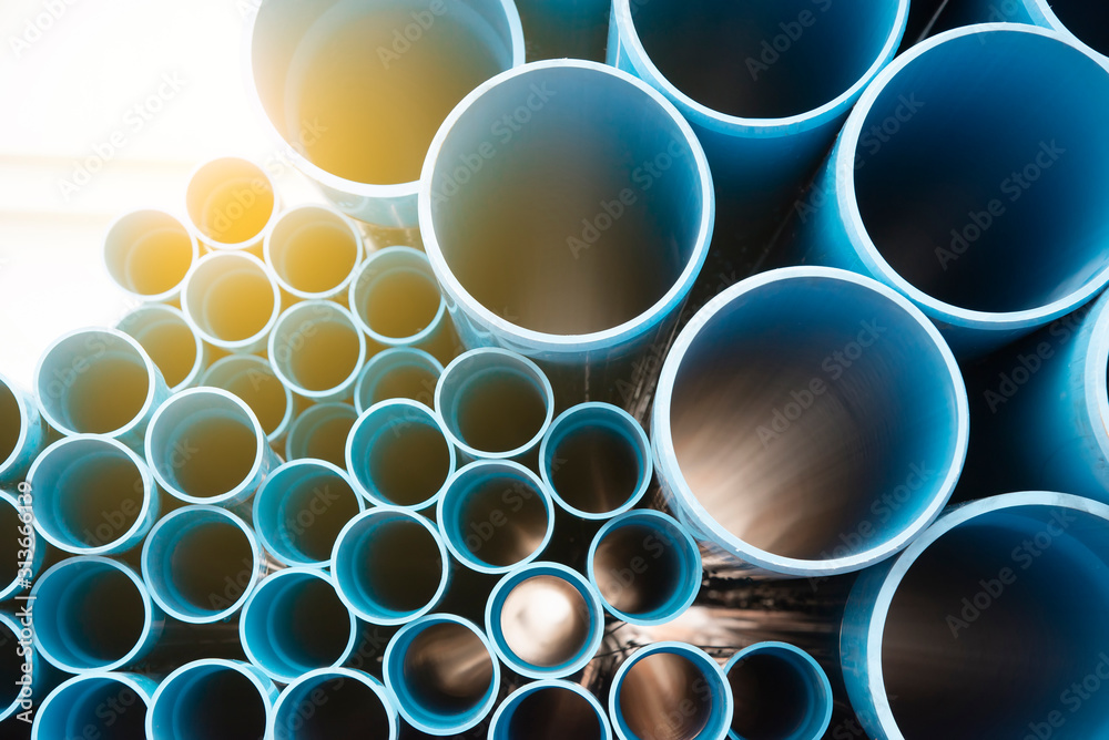 Blue plastic pipes used in construction site.Blue PVC water pipe in ...
