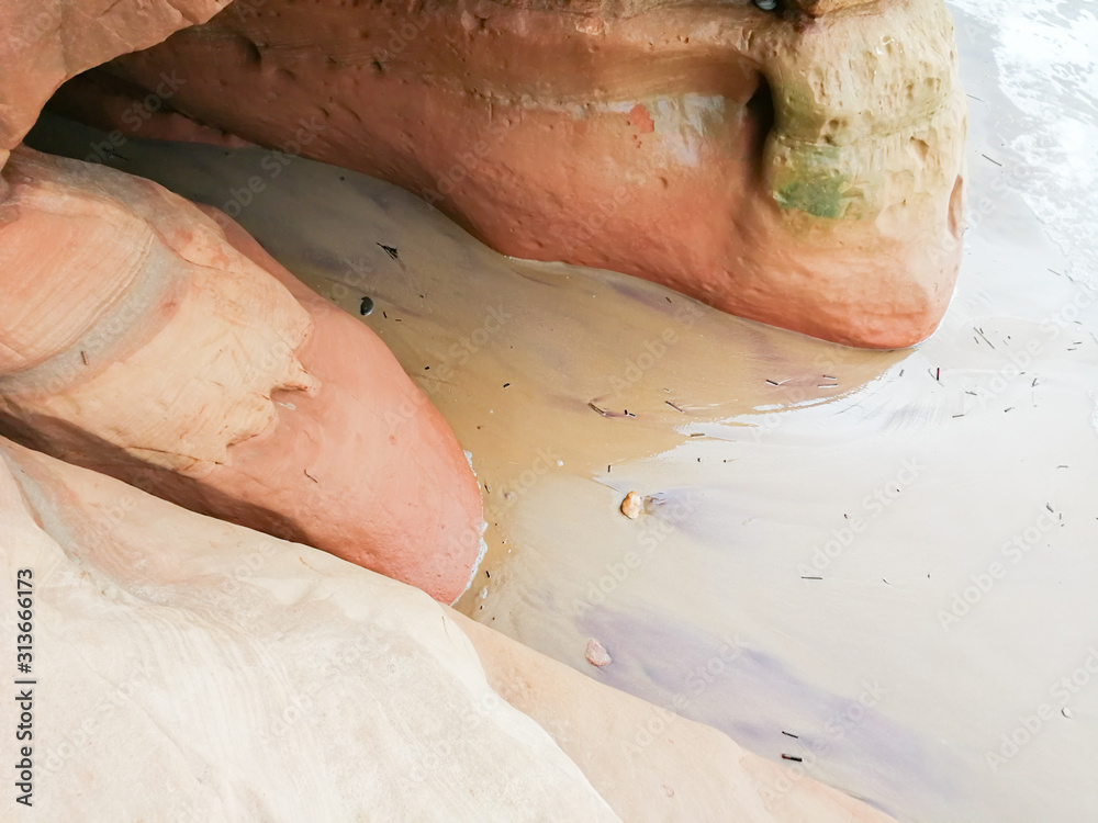 Orange sandstone cliffs at the Baltic seashore. Sandstone beach in ...