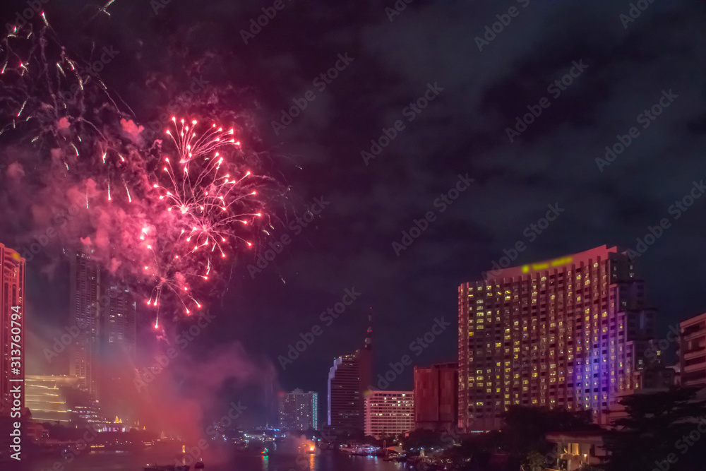 Celebration of New year day with colorful fireworks on Chao Phraya ...