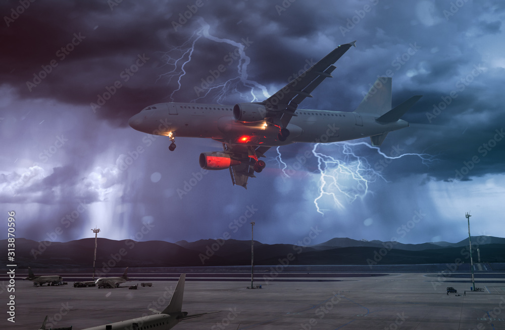 airplane flies in bad weather and storm with lightning bolt at airport ...