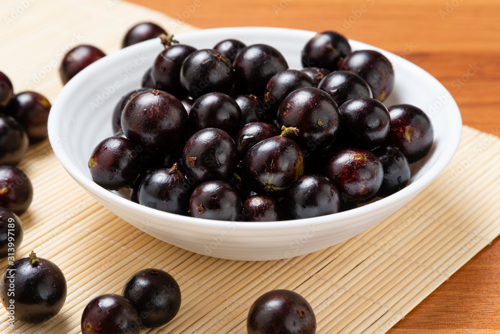 Jabuticaba in the bowl. Jaboticaba or Jabuticaba is the native ...