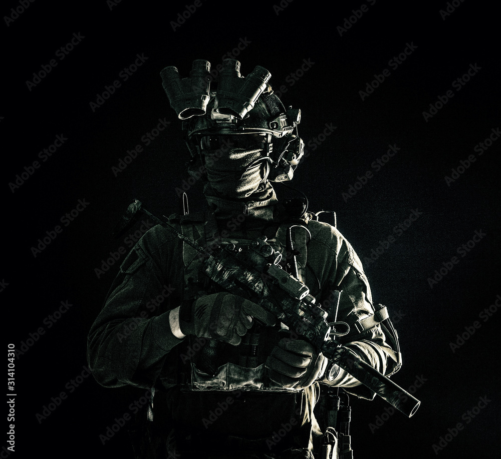 Army special operations forces soldier in mask and combat uniform ...