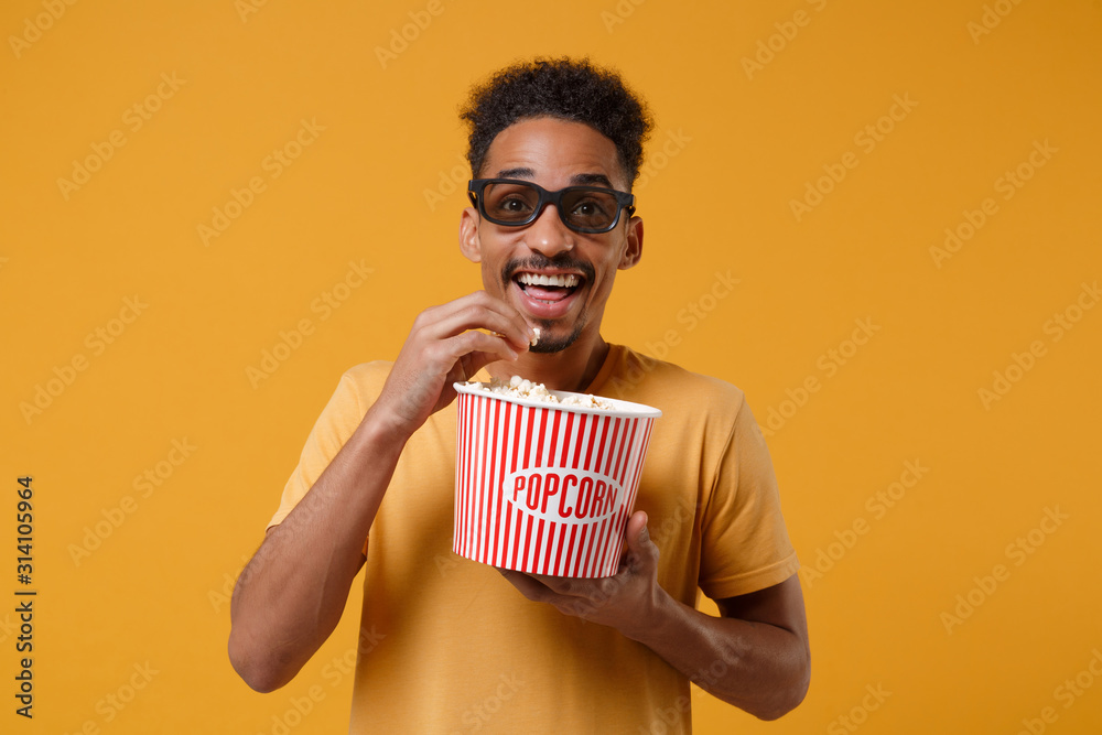 Excited young african american guy in 3d imax glasses posing isolated ...