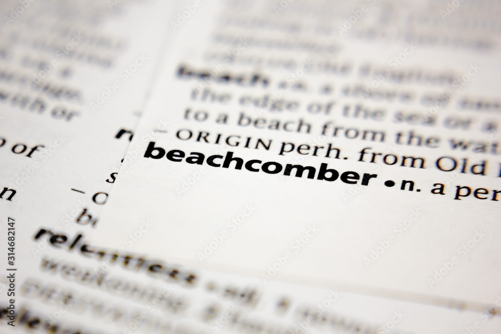 Word or phrase beachcomber in a dictionary. の Stock フォト | Adobe Stock