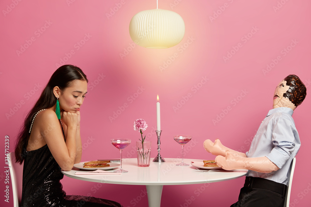 Sad depressed Korean woman looks bored during date, upset because of ...