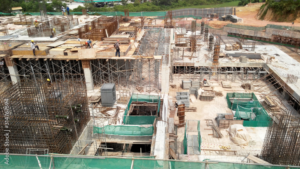 Steel reinforced concrete column under construction. It is as part of ...