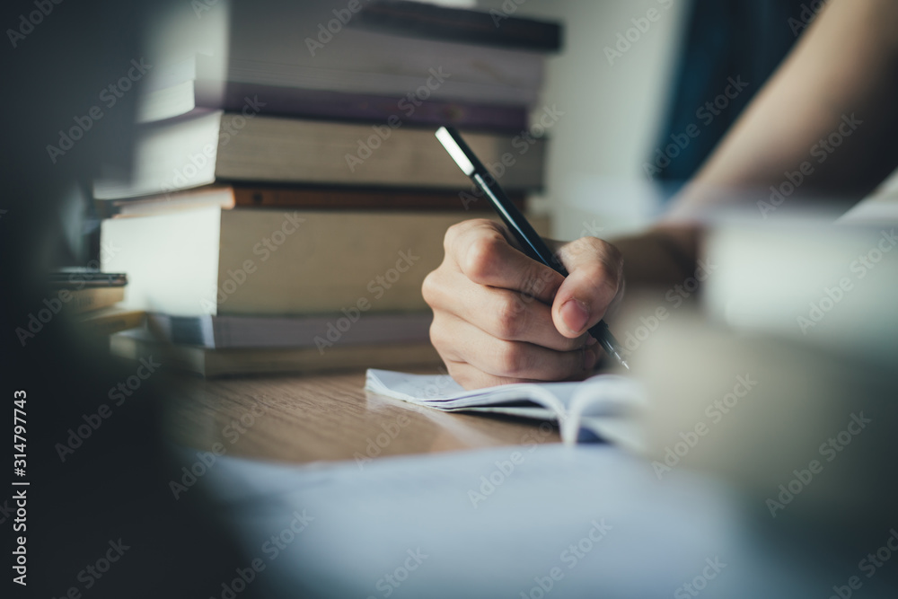 high school,university student study.hands holding pencil writing paper ...