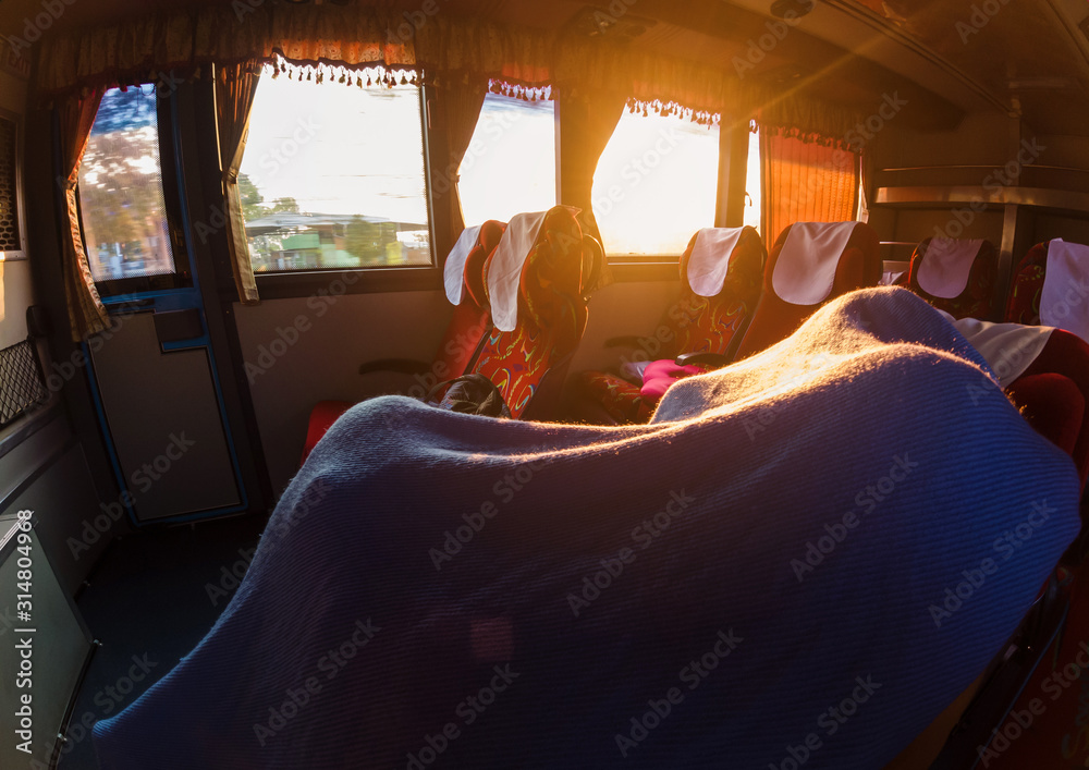 Sleeping bus service to travel between city in Thailand, Man on a long ...