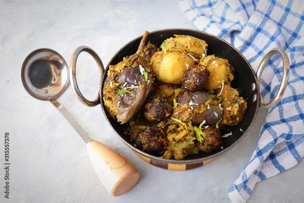Food - Traditional Indian Gujarati dish Surti Undhiyu. Its a mixed ...