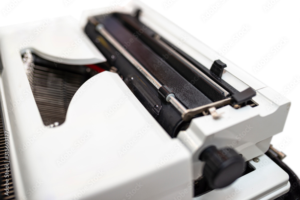 Stock-Foto „Classic, manual typewriter in white with a German keyboard ...