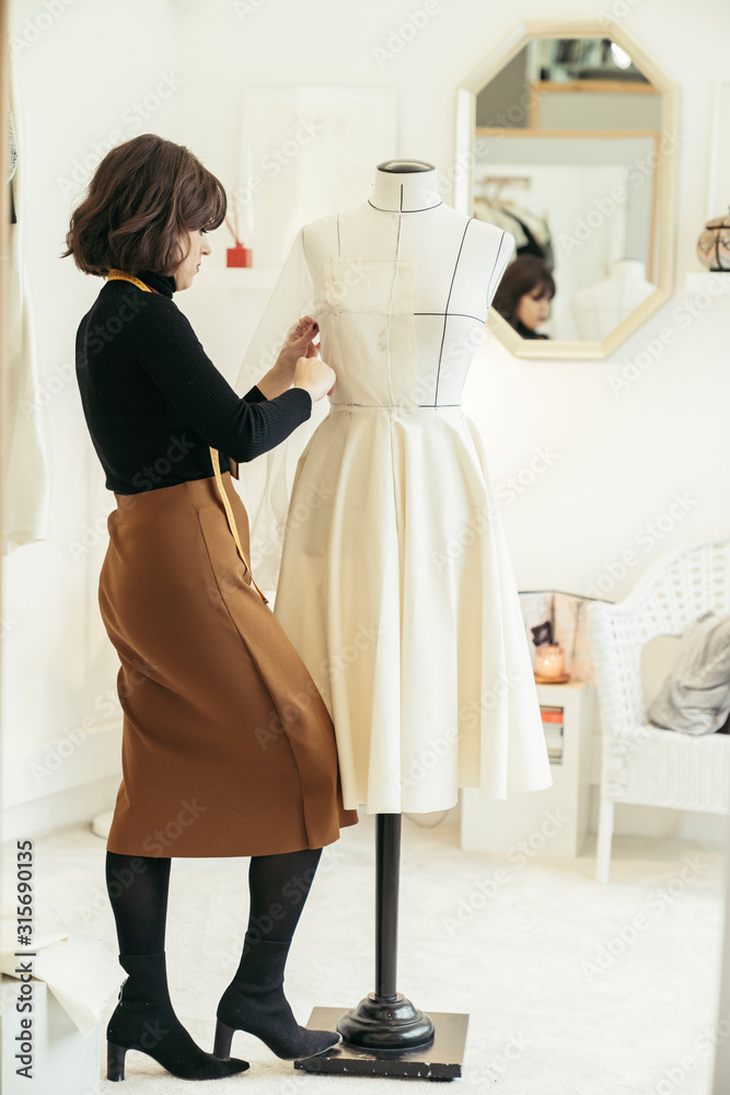 Fashion designer at work Stock Photo | Adobe Stock