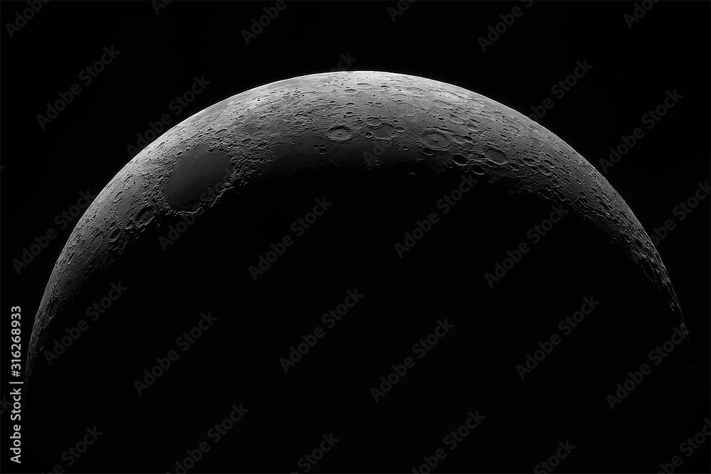 Crescent of a young moon with a large increase. Moon, view through a ...