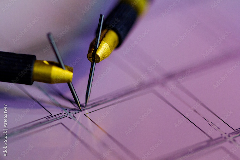 Manual probe system with needles for test of semiconductor on silicon ...