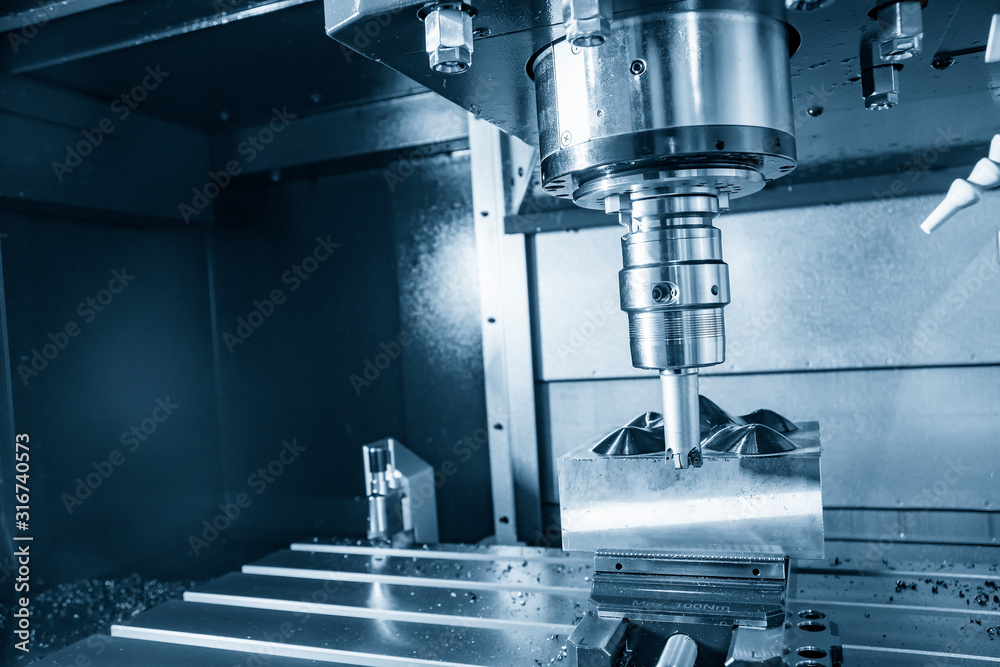 The CNC milling machine finishing cut the injection mold parts by ...