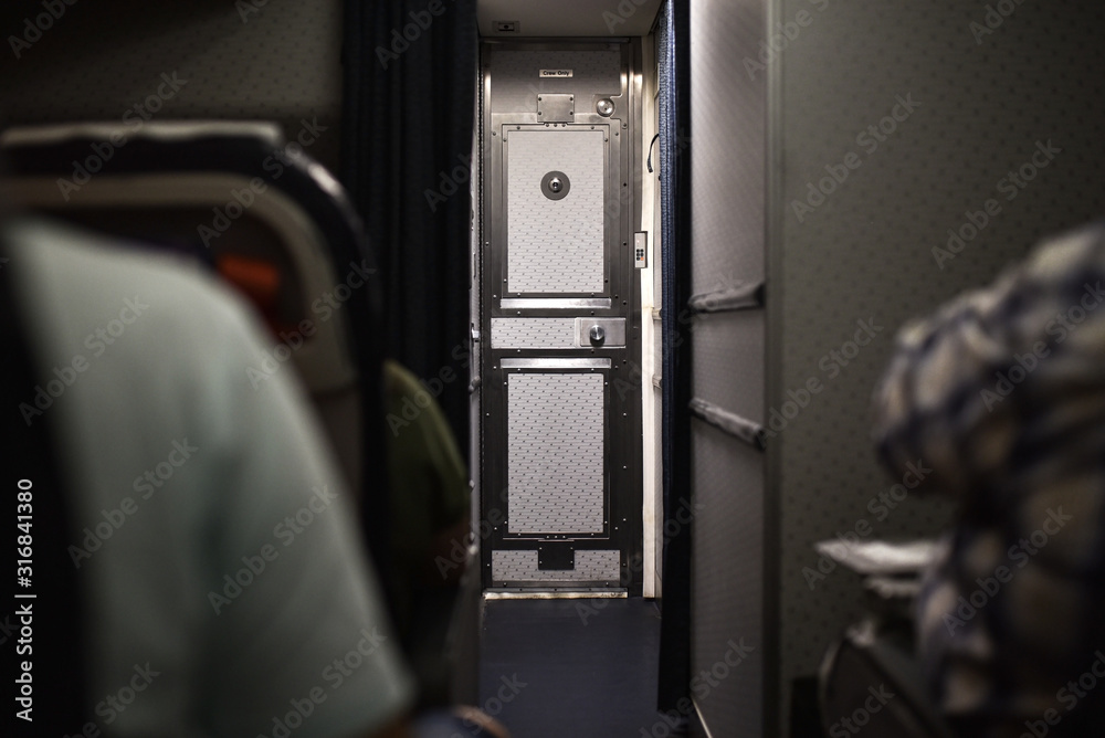 Closed cockpit door on an airplane Stock Photo | Adobe Stock