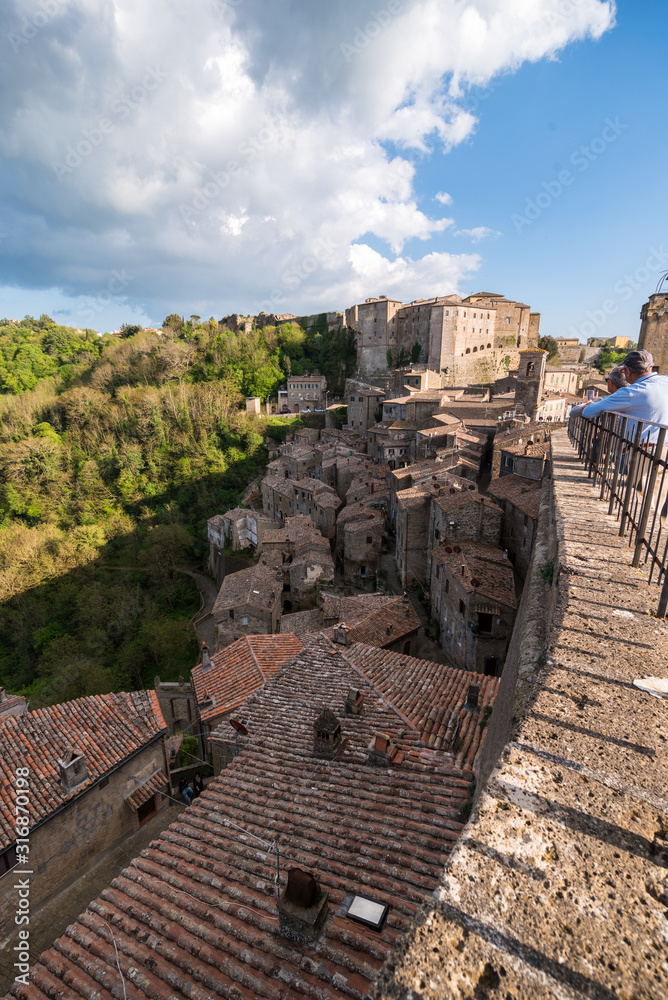 Panoramic view of small vilage in Italy with red brick houses and ...