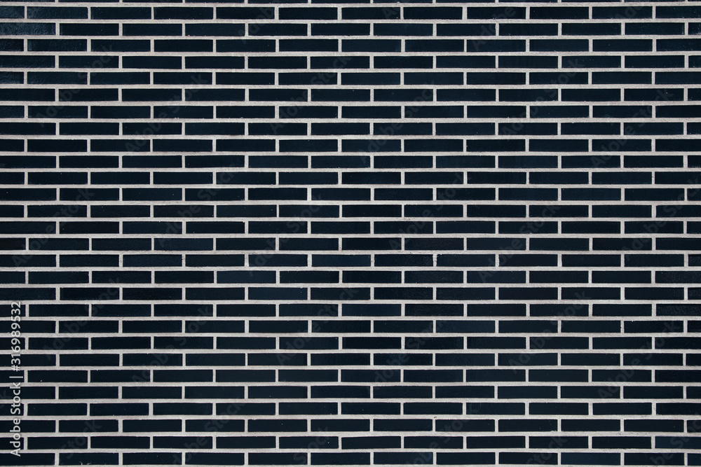 Foto de Stock pared de un edificio, muro de ladrillos negro, textura ...