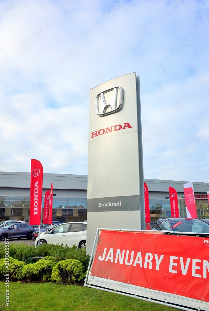 The Honda Car dealership sign and sales event banner with various ...