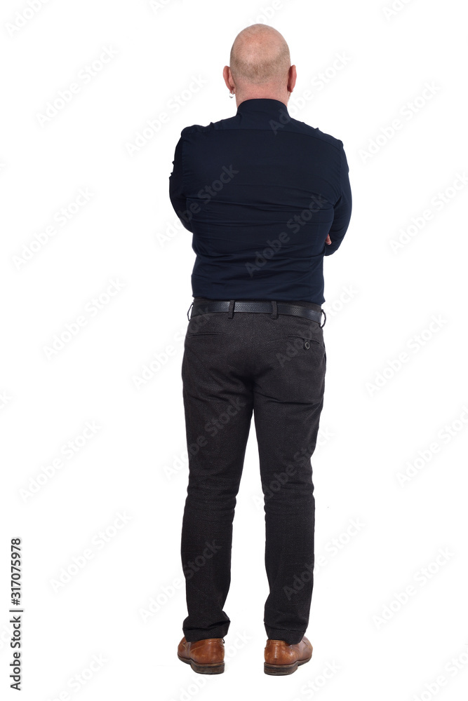 full portrait of a man from behind on white background, arms crossed ...
