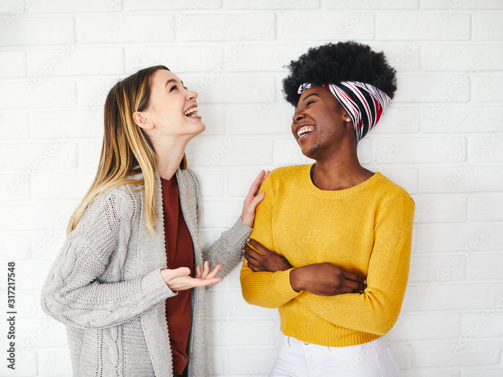 two young girls talking chatting friends friendship conversation Stock ...