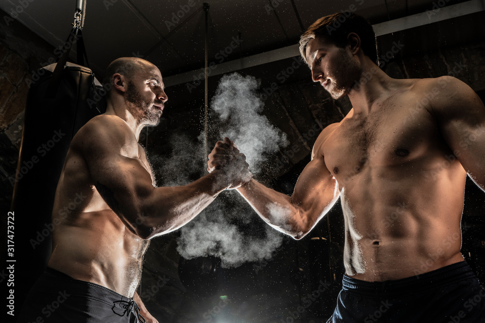 Handshake arm wrestling style. Strong and muscular arms. Friendly ...