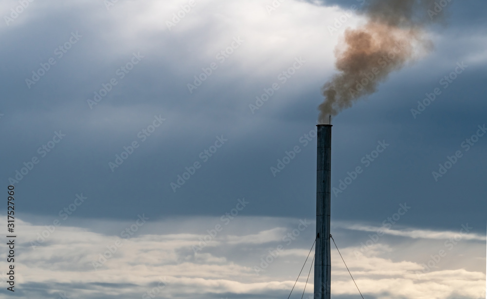 Air pollution from factory. Smoke from chimney of industrial pipe on ...