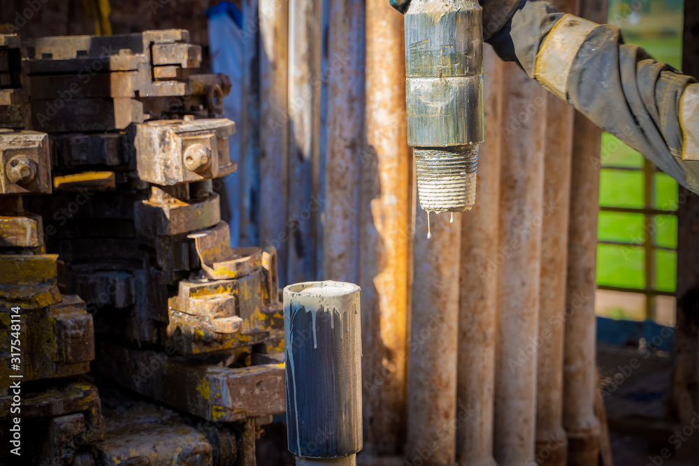 Offshore oil rig worker prepare tool and equipment for perforation oil ...