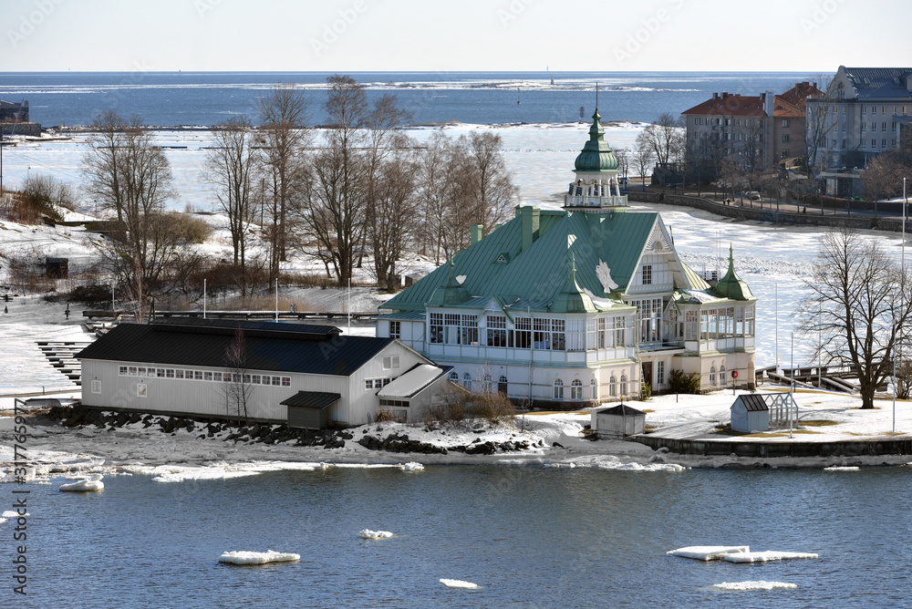 Valkosaari, little island. Big white wooden pavilion with its green ...