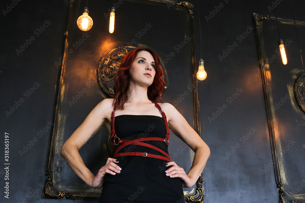 Sexy woman model in a harness Stock Photo | Adobe Stock