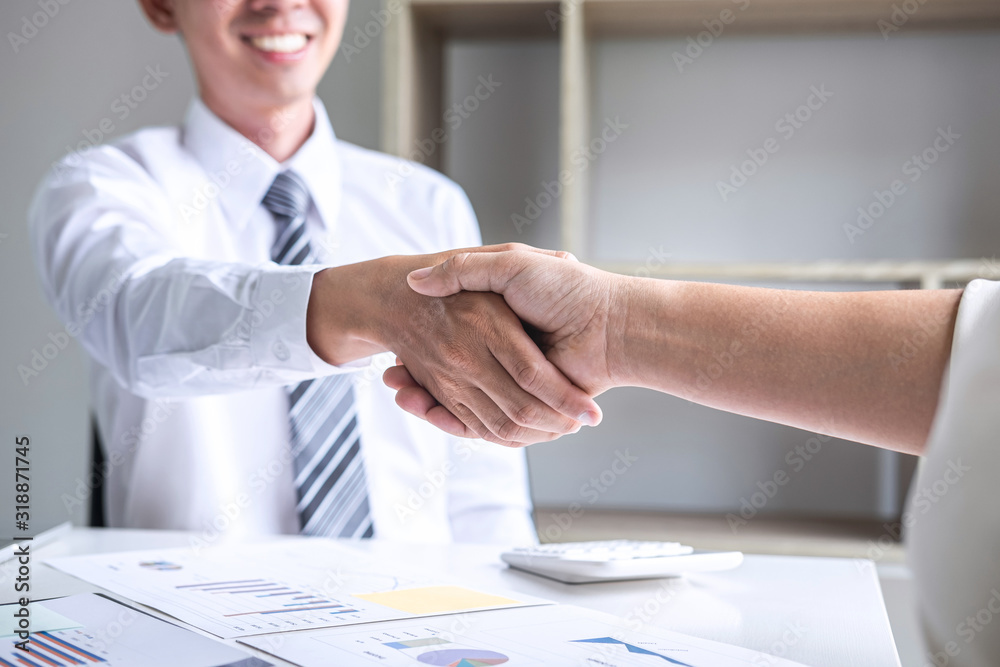 Finishing up a conversation after collaboration, handshake of two ...