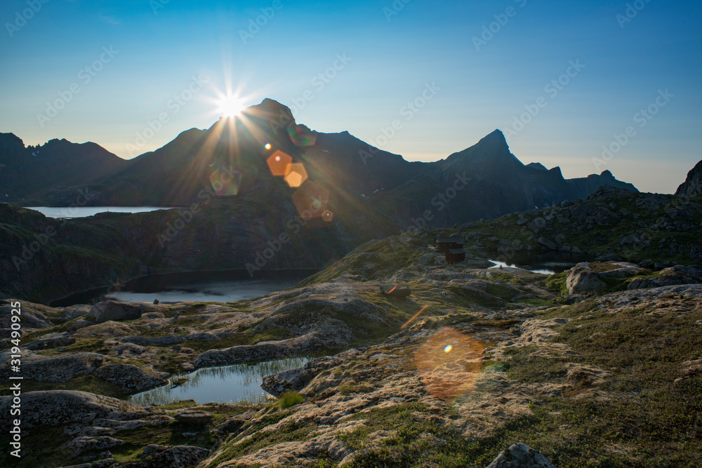 Munkebu Sunset - Setting sun over Munkebu and huts on Munken Trail on ...