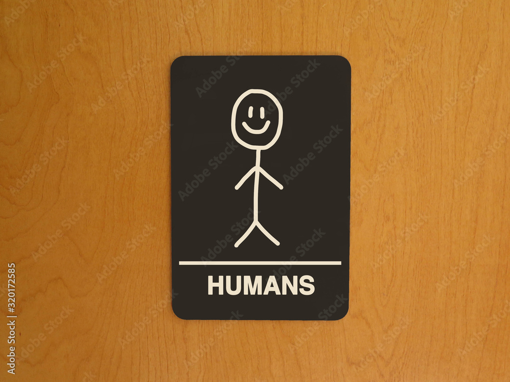 Restroom sign with a graphic symbol and the word, "Humans" Stock Photo ...