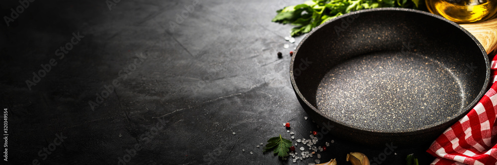 Food cooking background on black table. Stock Photo | Adobe Stock