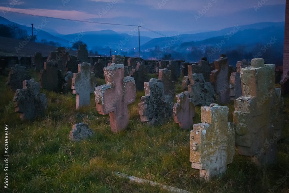 Scary looking cemetery in Serbia with a spooky village seen in the ...