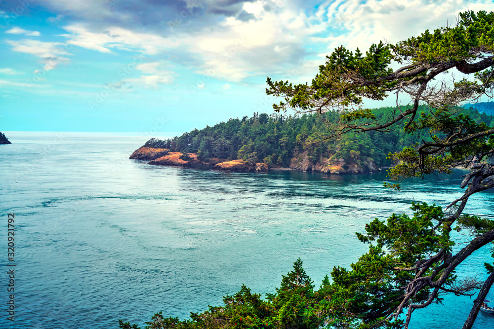 Coastal views of the bay area from a hiking trail in Deception Pass ...