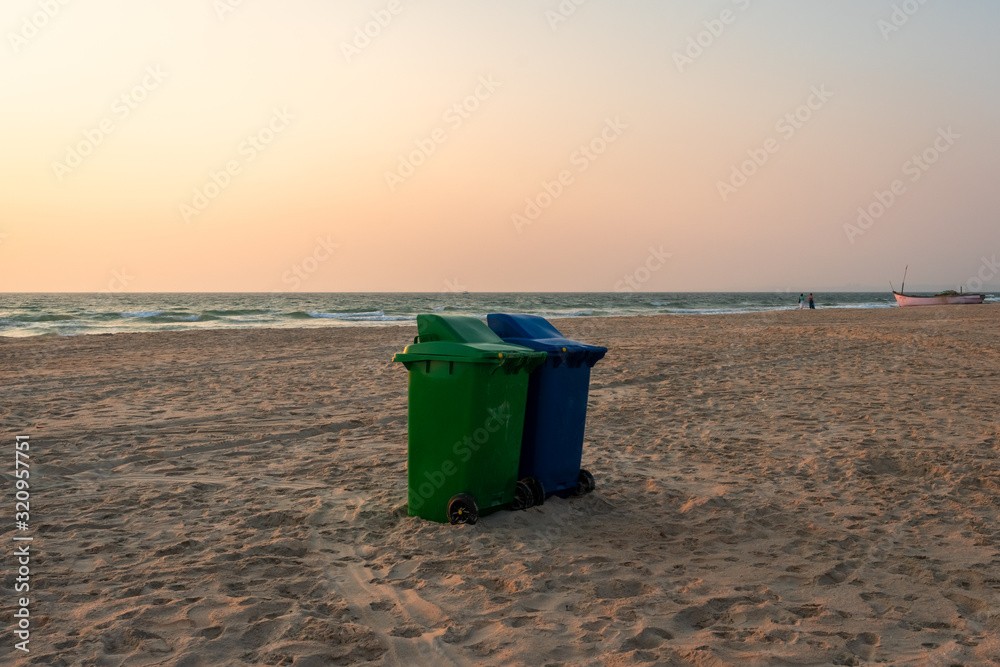 Garbage containers installed on beach. Campaign against environmental ...