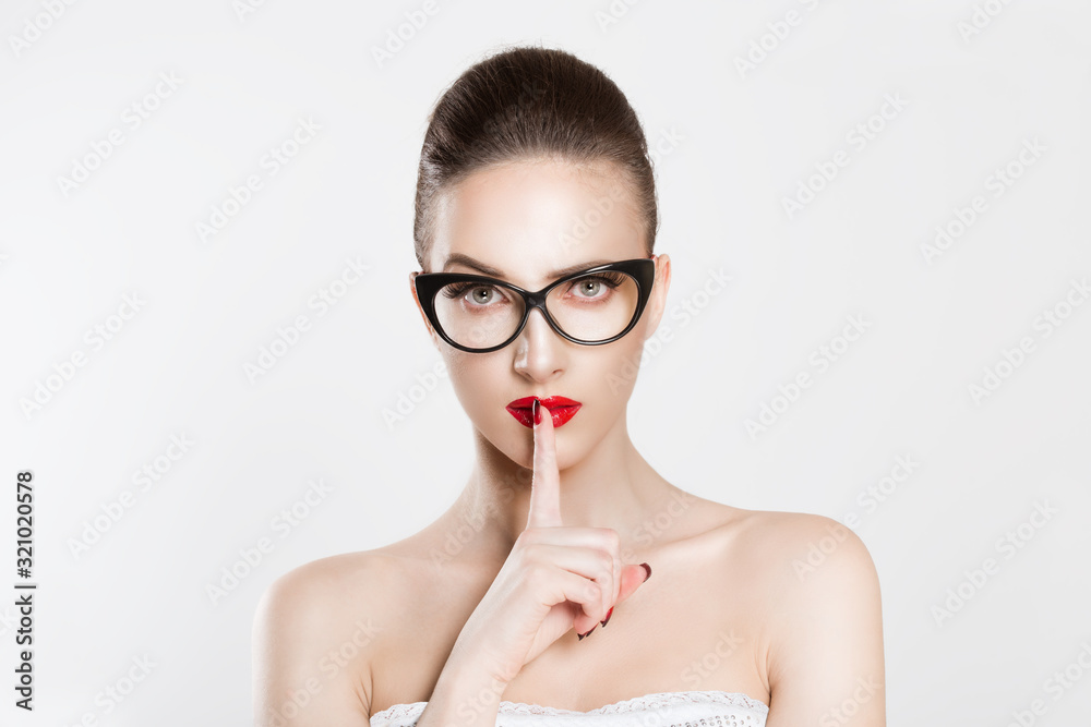 Beautiful angry Woman with eyeglasses eyebrows raised asking for ...