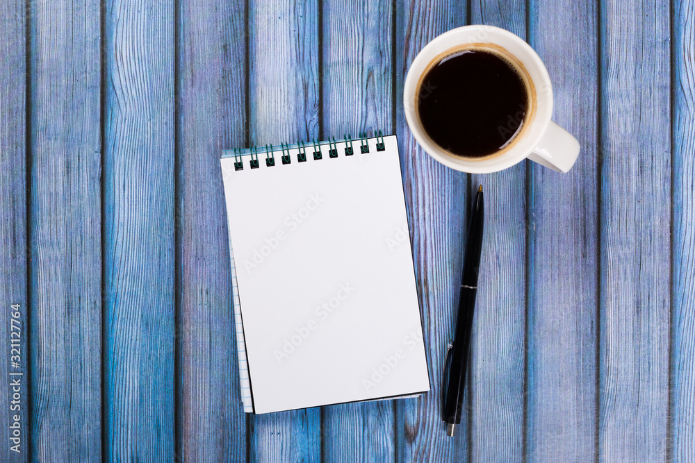 top view of blank open notebook paper on background, office equipment ...