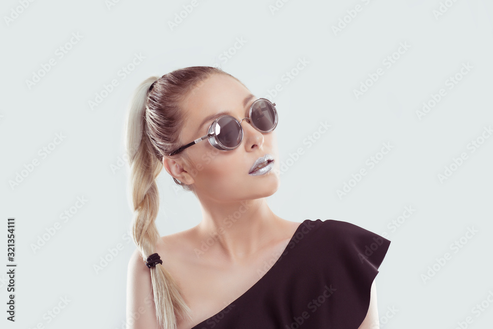 Look at my style, I am all metallic shiny. Woman shows gray metallic ...