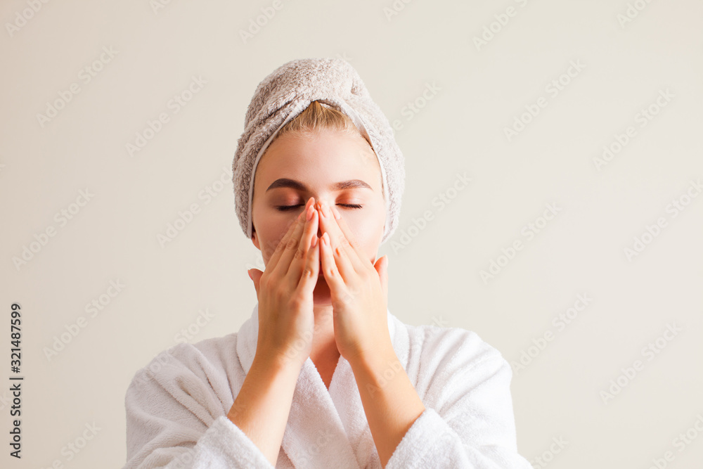 Pretty woman doing facial gymnastics in the morning. System of ...