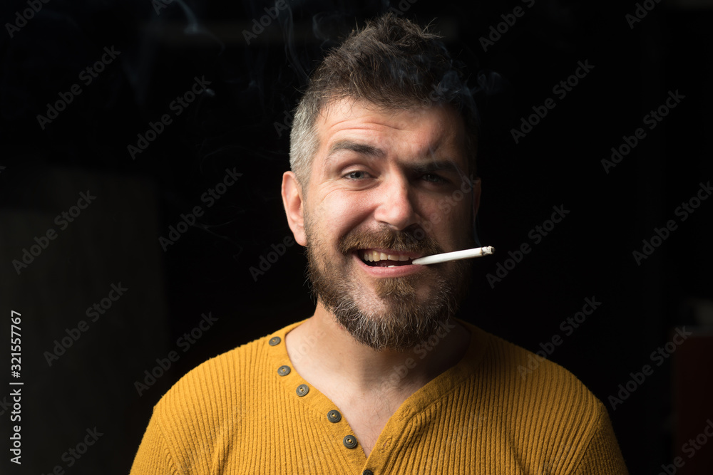Bearded hipster man smoking cigarette. Man with bad harmful for his ...